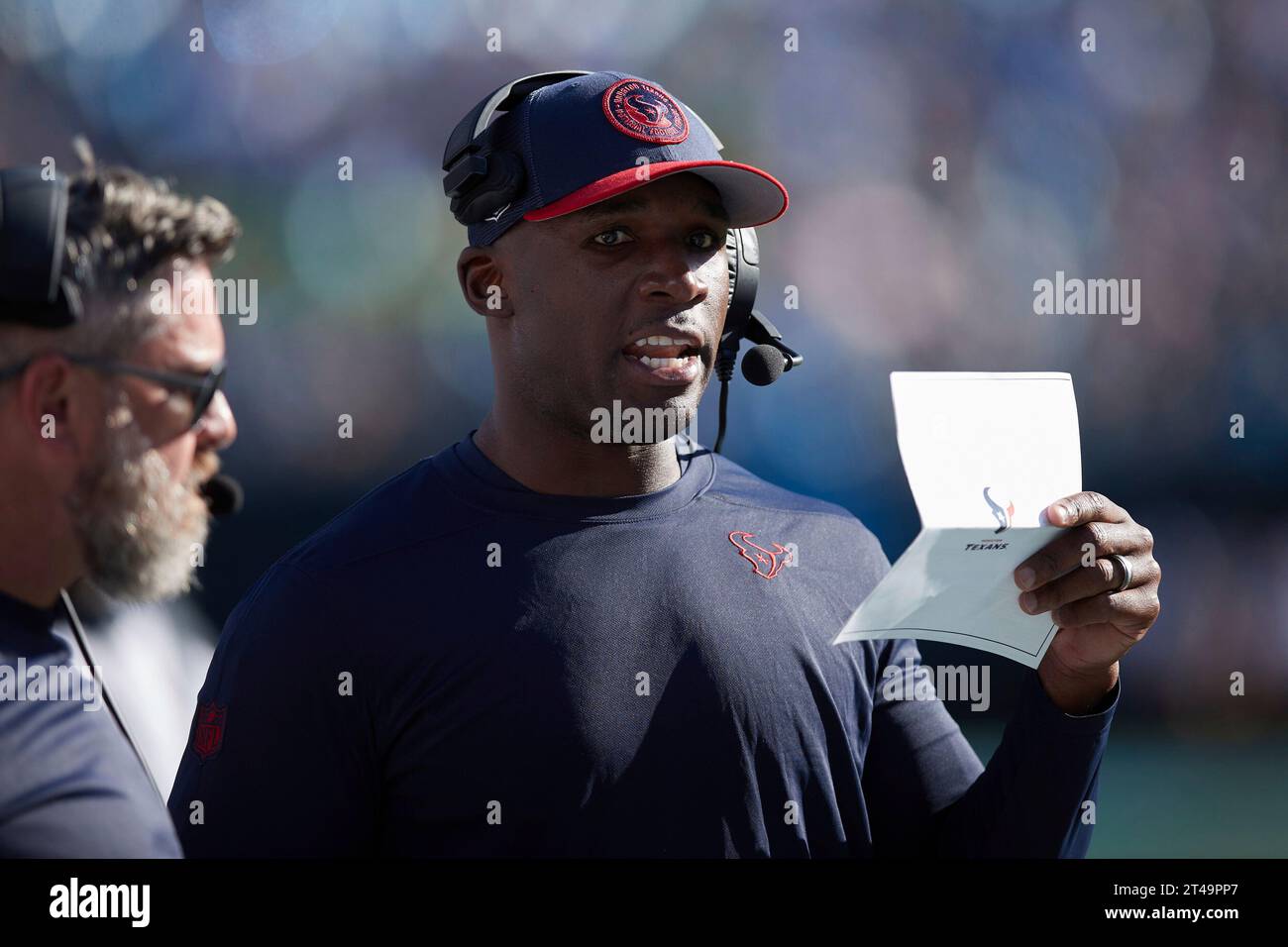 Houston Texans head coach DeMeco Ryans calls a play on defense during an NFL football game ...