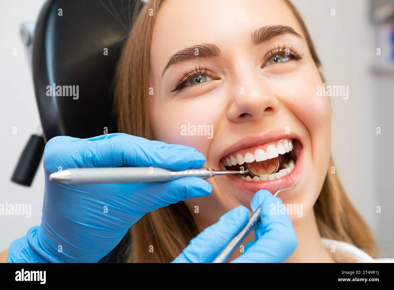 Dentist wearing gloves uses hi-res stock photography and images - Alamy