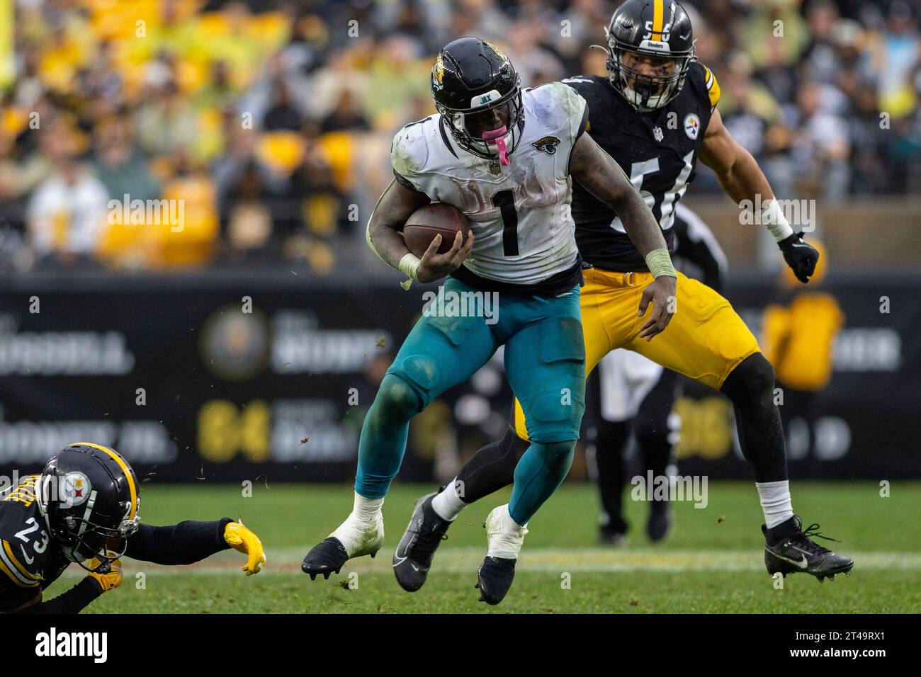 Jacksonville Jaguars running back Travis Etienne Jr. (1) rushes during ...