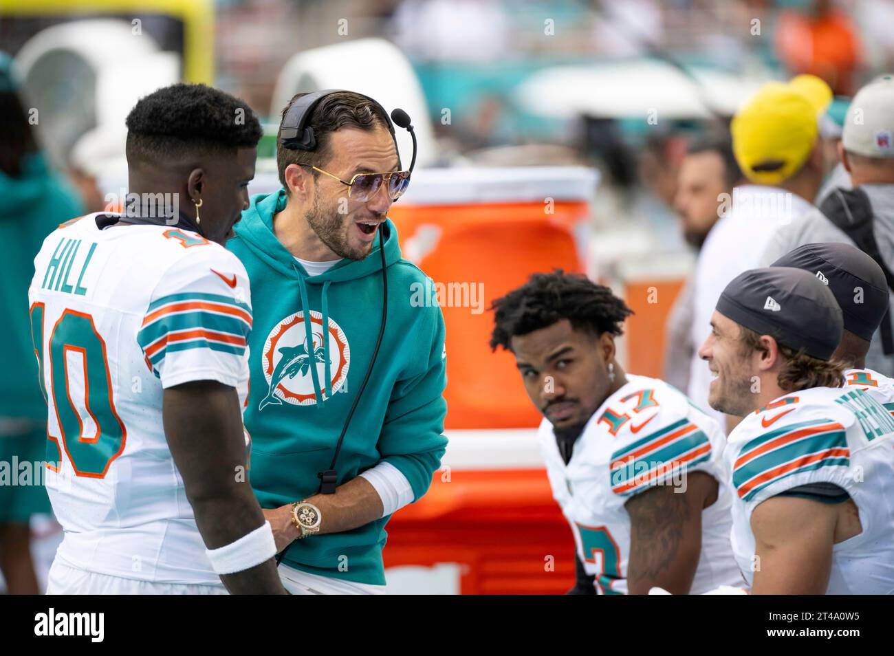 Miami Dolphins head coach Mike McDaniel laughs as he talks with wide ...