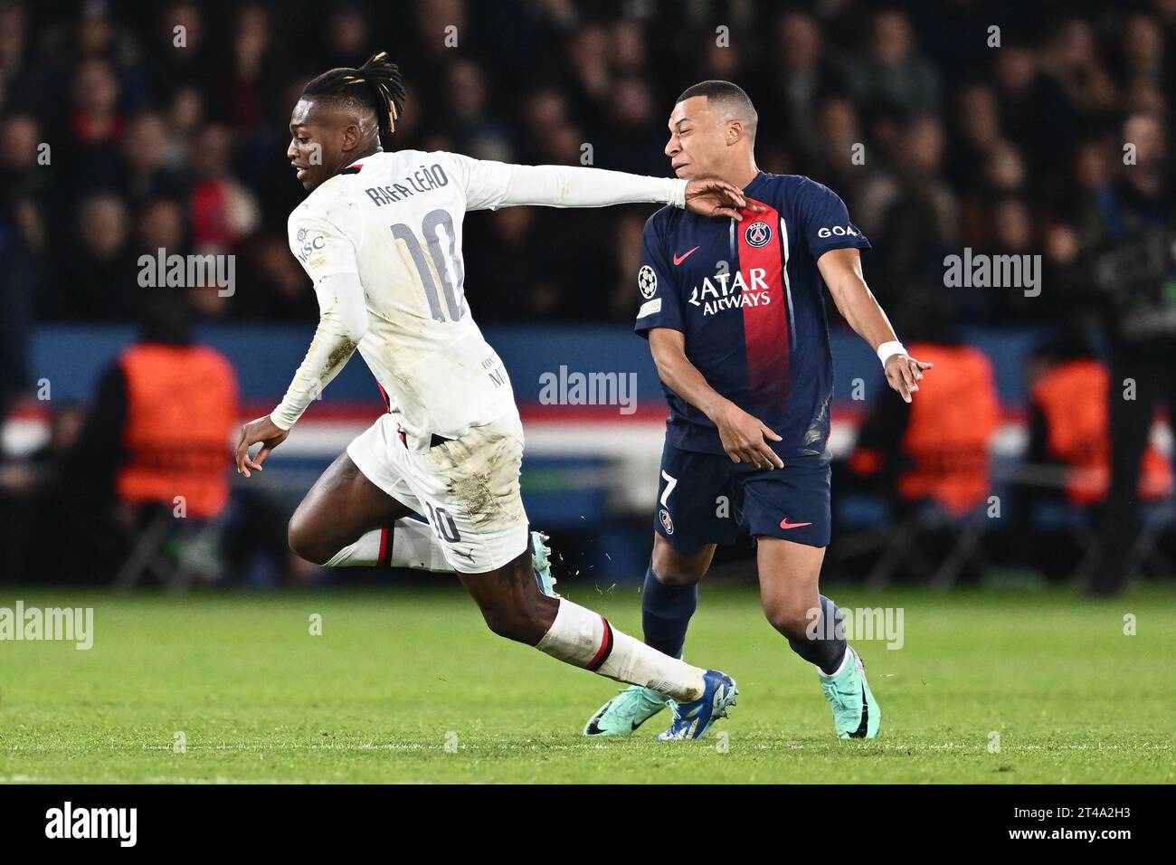 PARIS, FRANCE - OCTOBER 25: Rafael Leao of AC Milan and Kylian Mbappe of Paris Saint-Germain ...