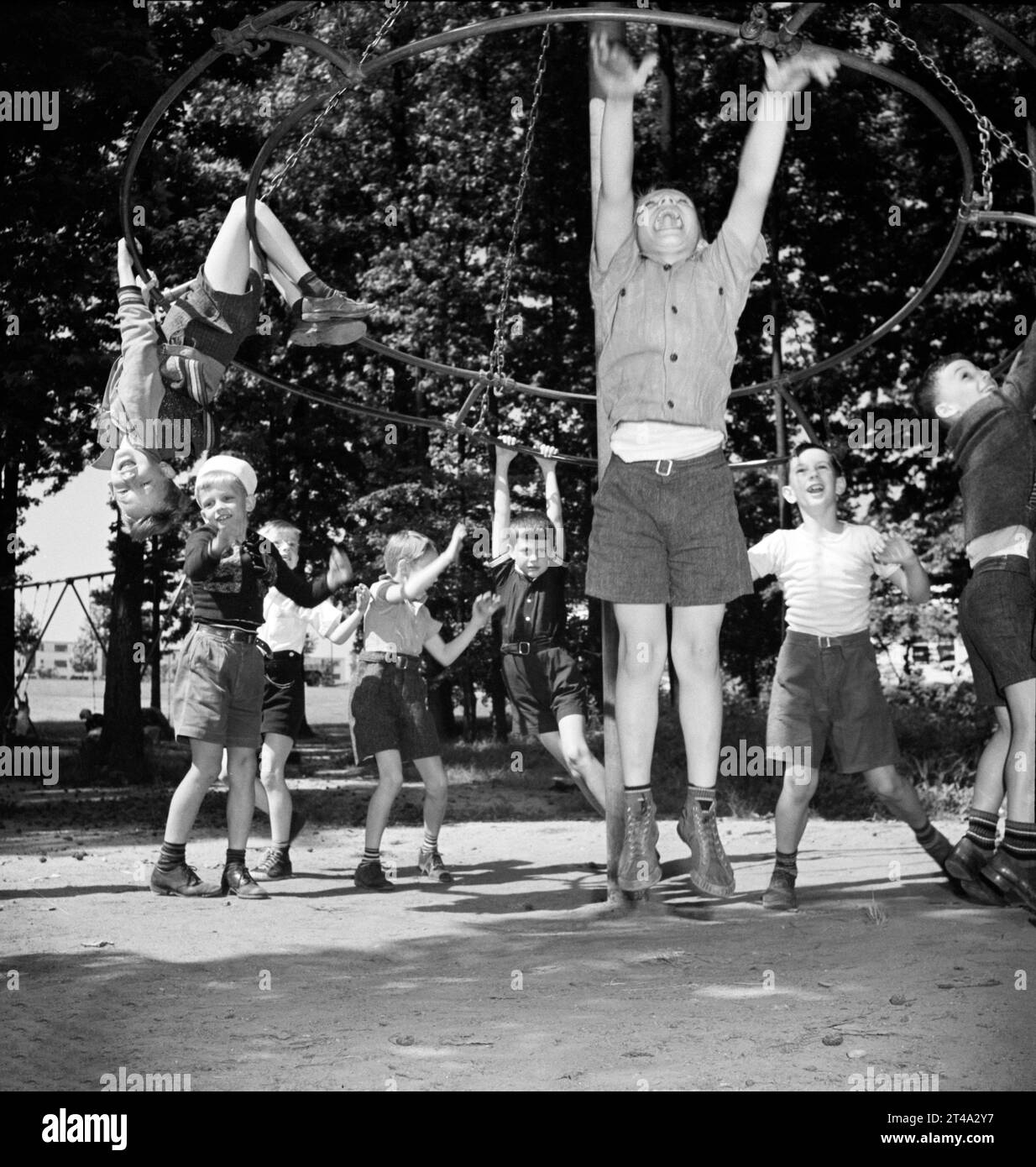 Children playing playground 1940s hi-res stock photography and images ...