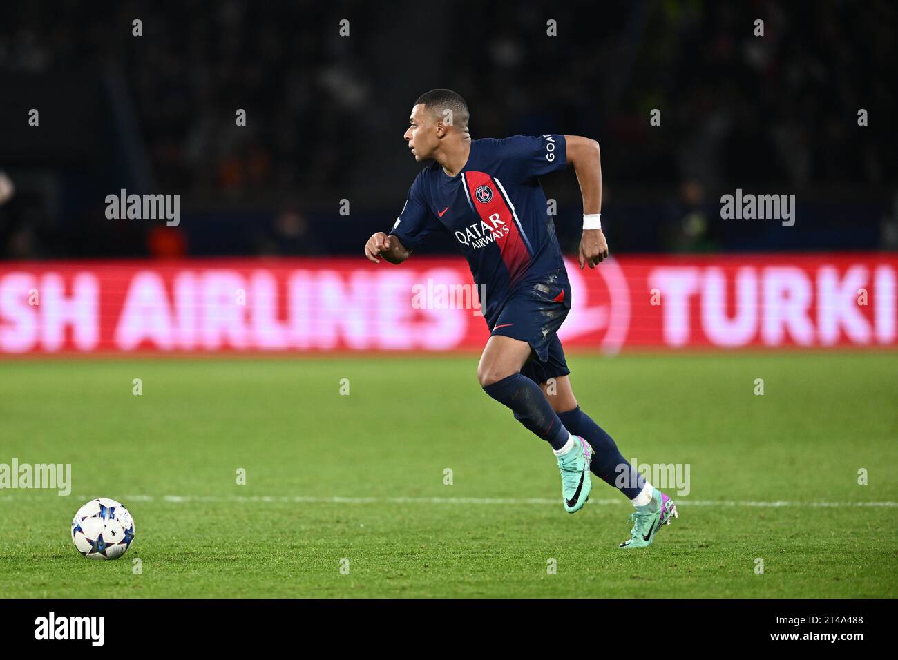 PARIS, FRANCE - OCTOBER 25: Kylian Mbappe of Paris Saint-Germain controls a ball during the UEFA ...