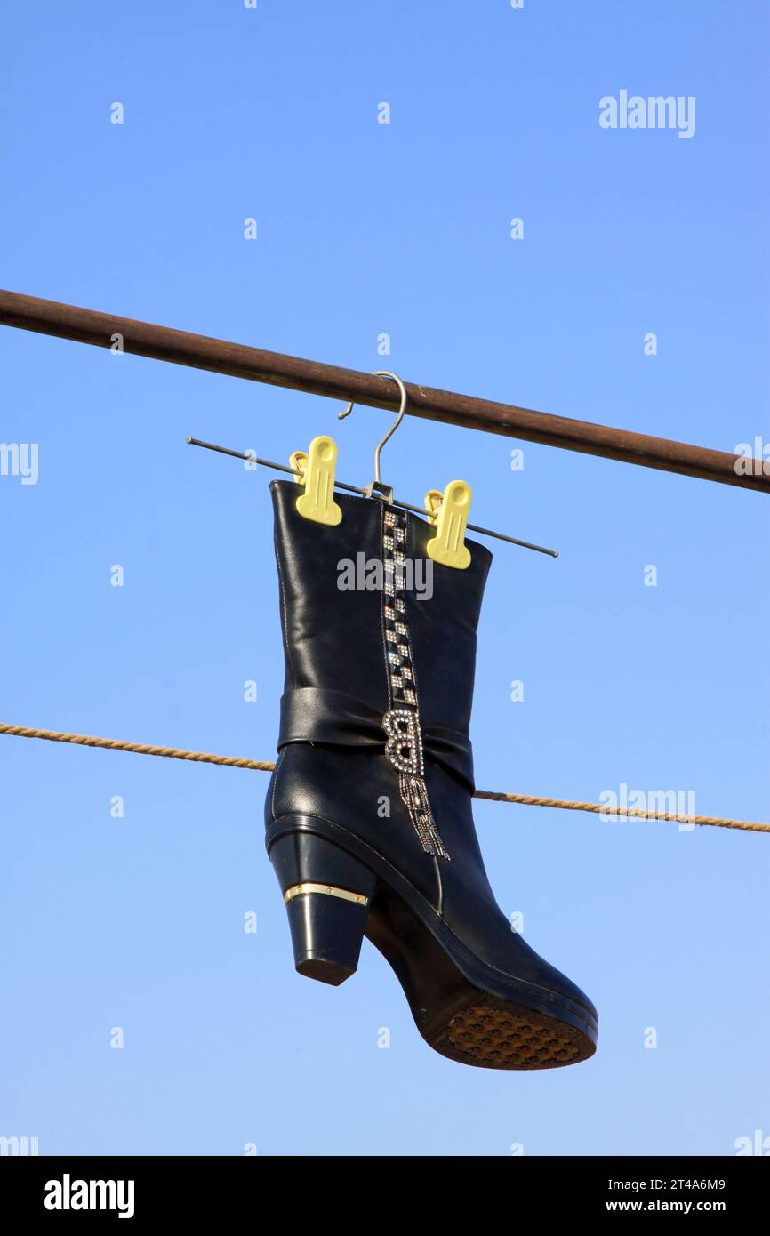 Leather boots china hi-res stock photography and images - Alamy