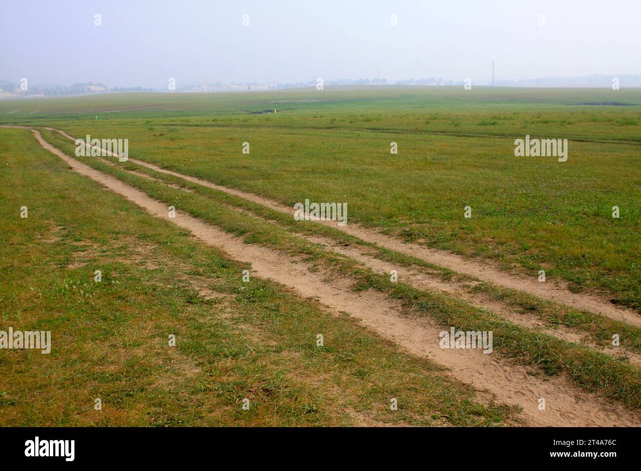 unsurfaced road in the WuLanBuTong grassland, Inner Mongolia autonomous ...
