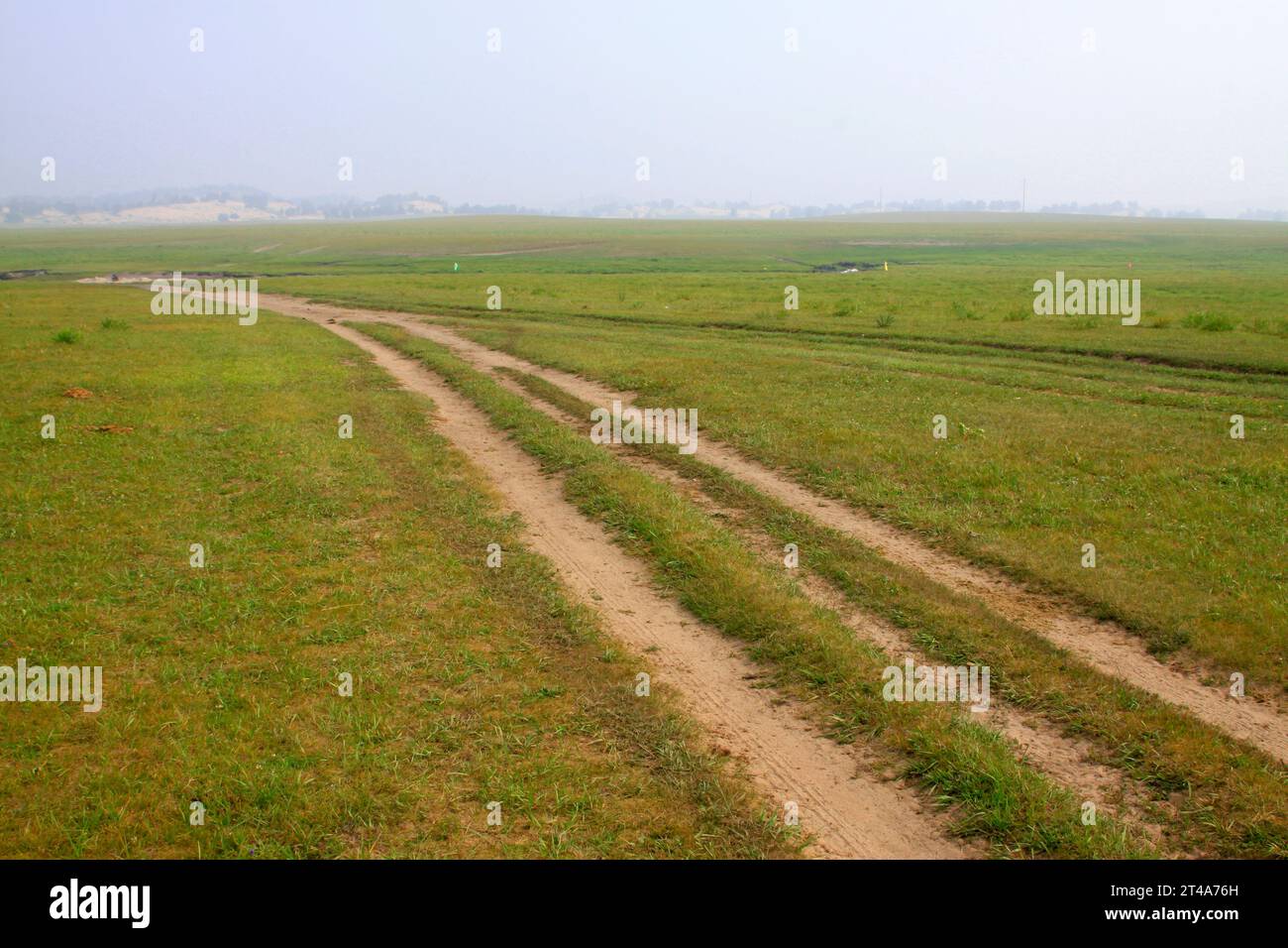unsurfaced road in the WuLanBuTong grassland, Inner Mongolia autonomous ...