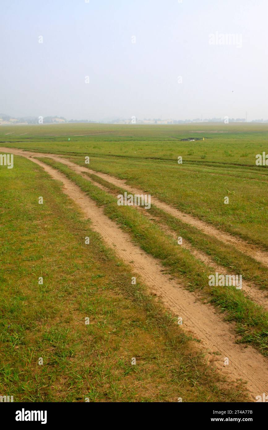 unsurfaced road in the WuLanBuTong grassland, Inner Mongolia autonomous ...