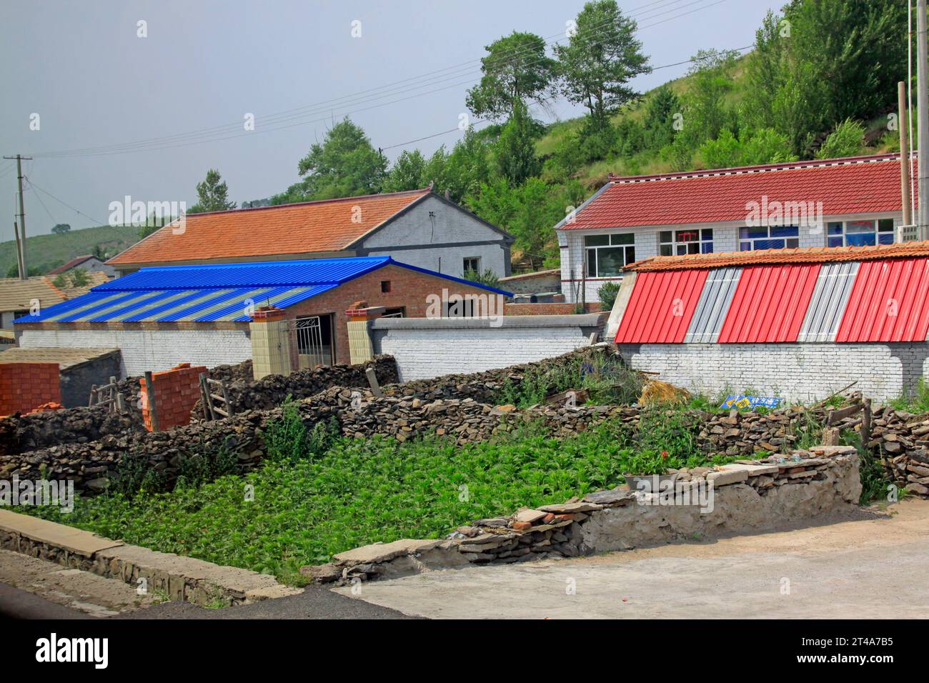 WEICHANG COUNTY - JULY 20: residents landscape architecture in the ...