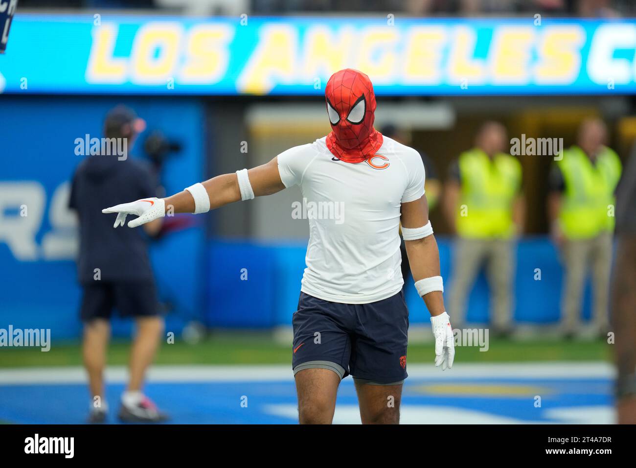 Chicago Bears cornerback Kyler Gordon wears a Spiderman mask as he ...