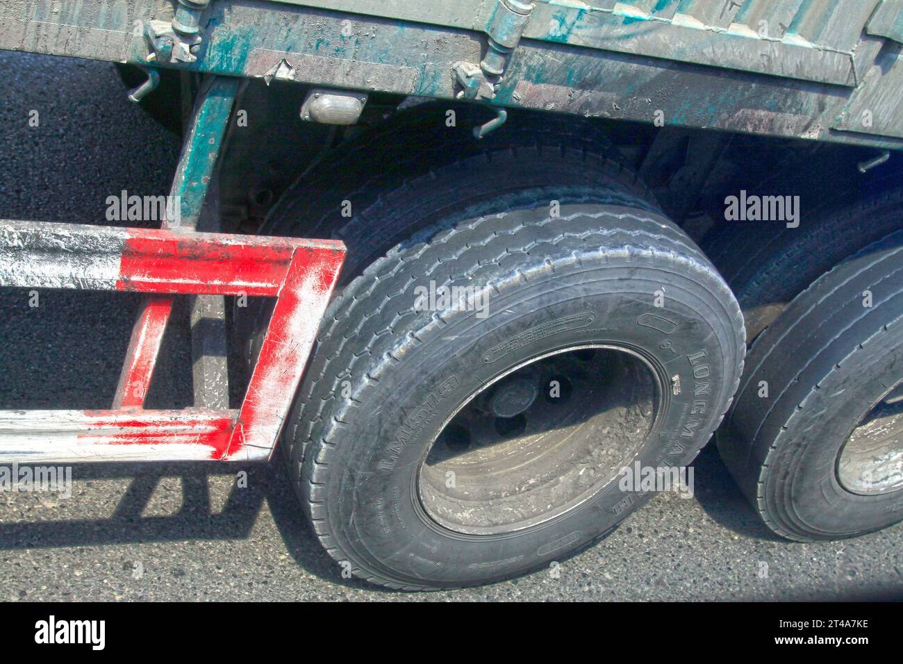 Overloaded truck wheels, closeup of photo Stock Photo - Alamy