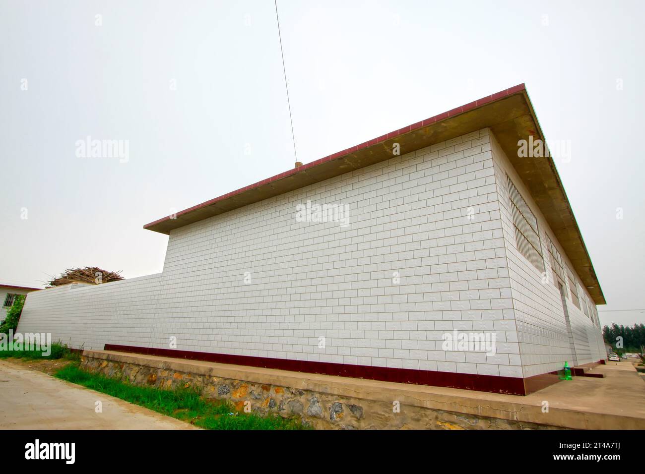 White ceramic tile house, closeup of photo Stock Photo - Alamy