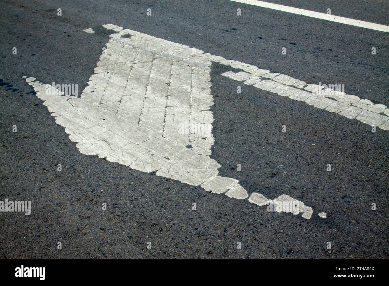 arrow mark on asphalt pavement Stock Photo - Alamy