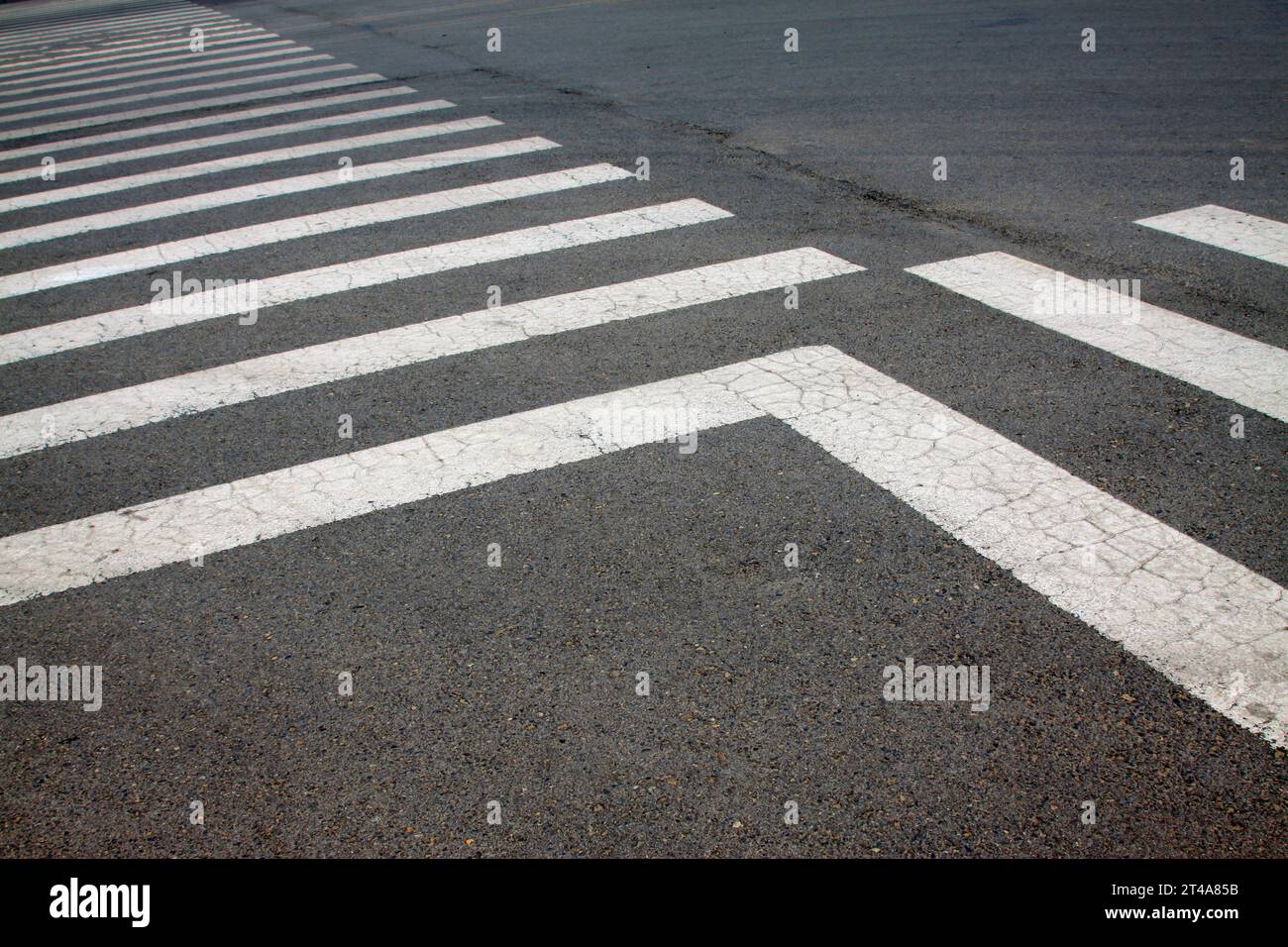 zebra crossing on asphalt pavement Stock Photo - Alamy