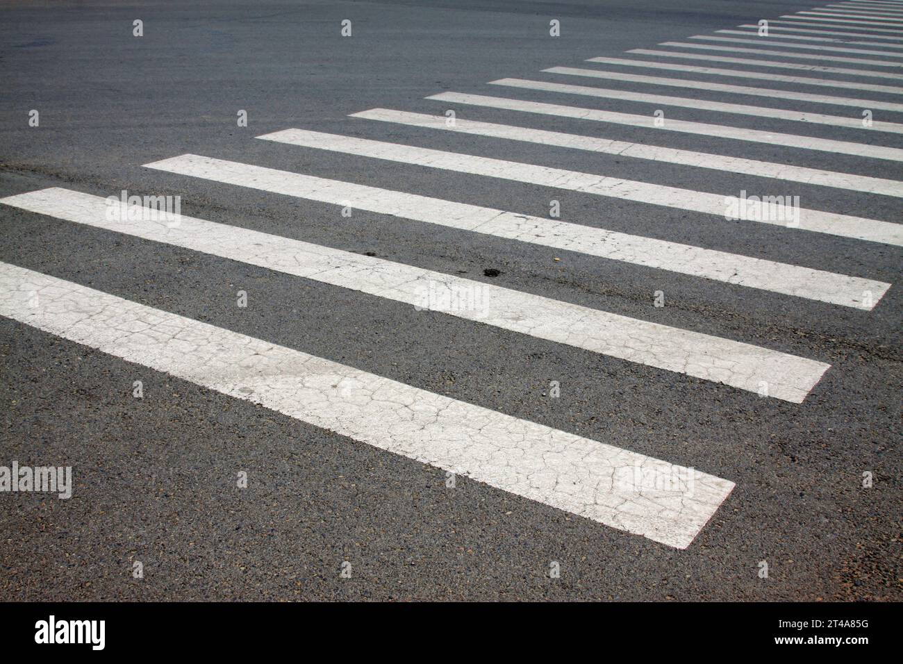 zebra crossing on asphalt pavement Stock Photo - Alamy