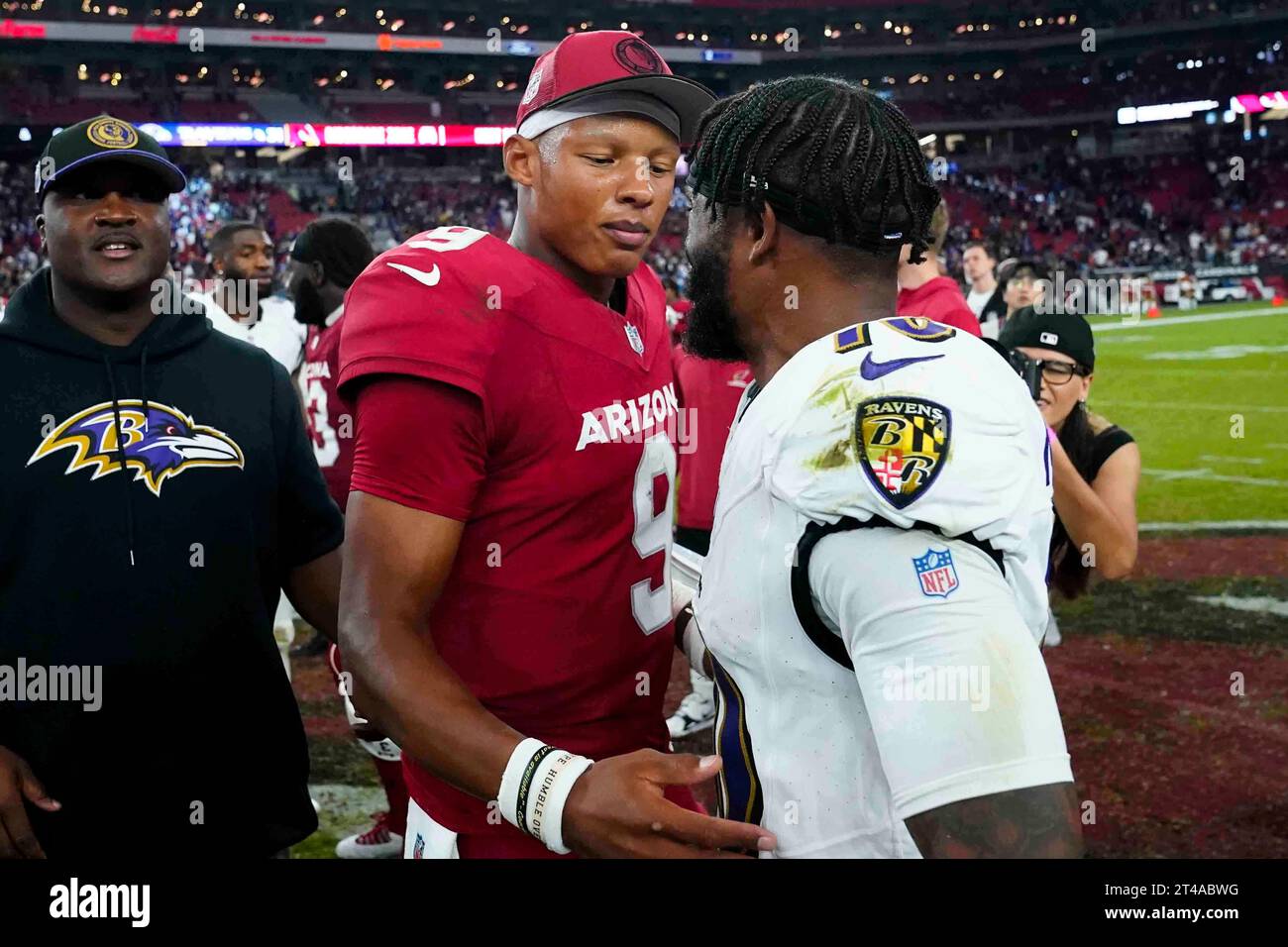 Arizona Cardinals quarterback Joshua Dobbs (9) greets Baltimore Ravens ...