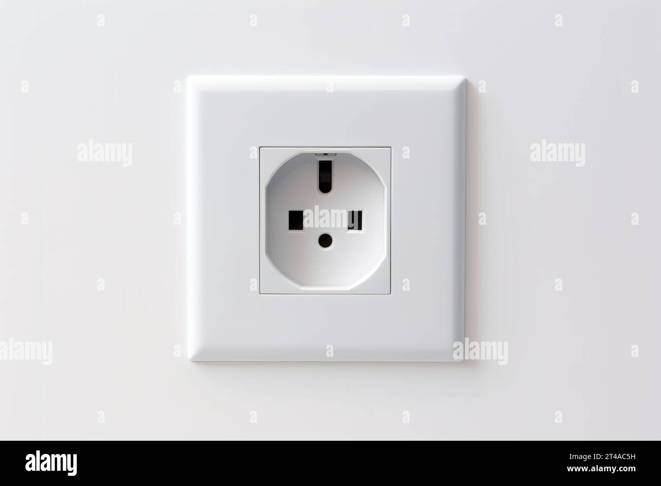 White wall mounted socket board with two electrical sockets and a ...