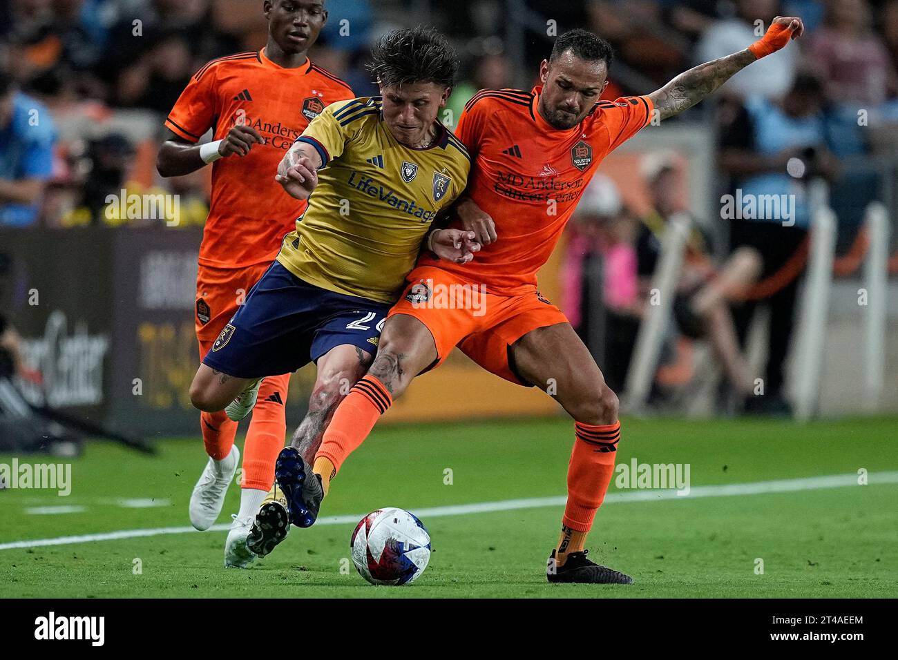 Real Salt Lake midfielder Diego Luna, front left, collides with Houston ...