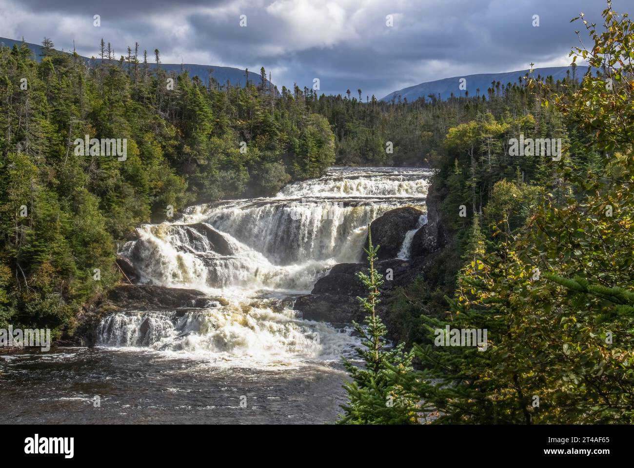 Baker's Brooks Falls in western Newfoundland with dark autumn skies and ...
