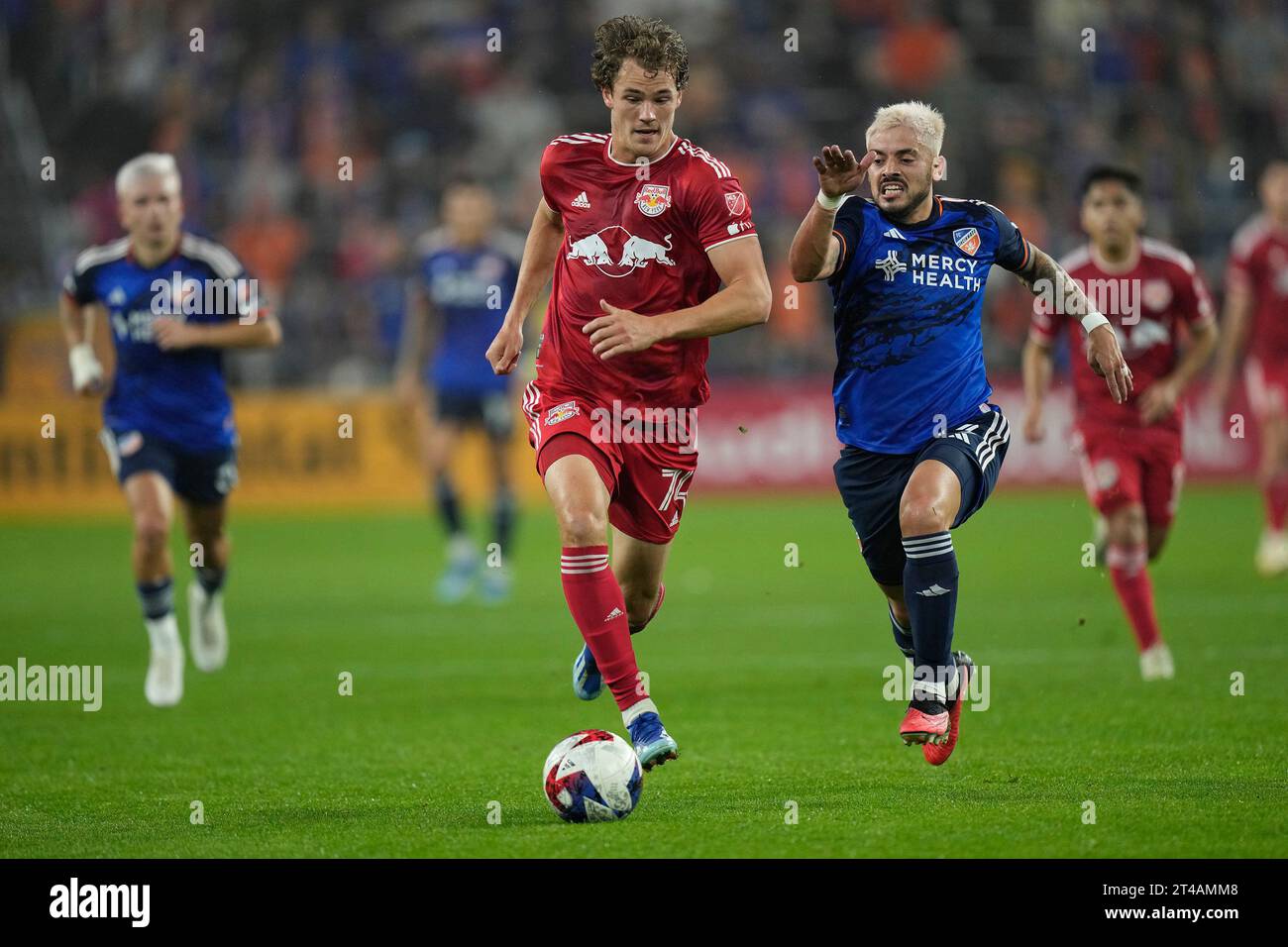 New York Red Bulls forward Tom Barlow (74) and FC Cincinnati midfielder ...