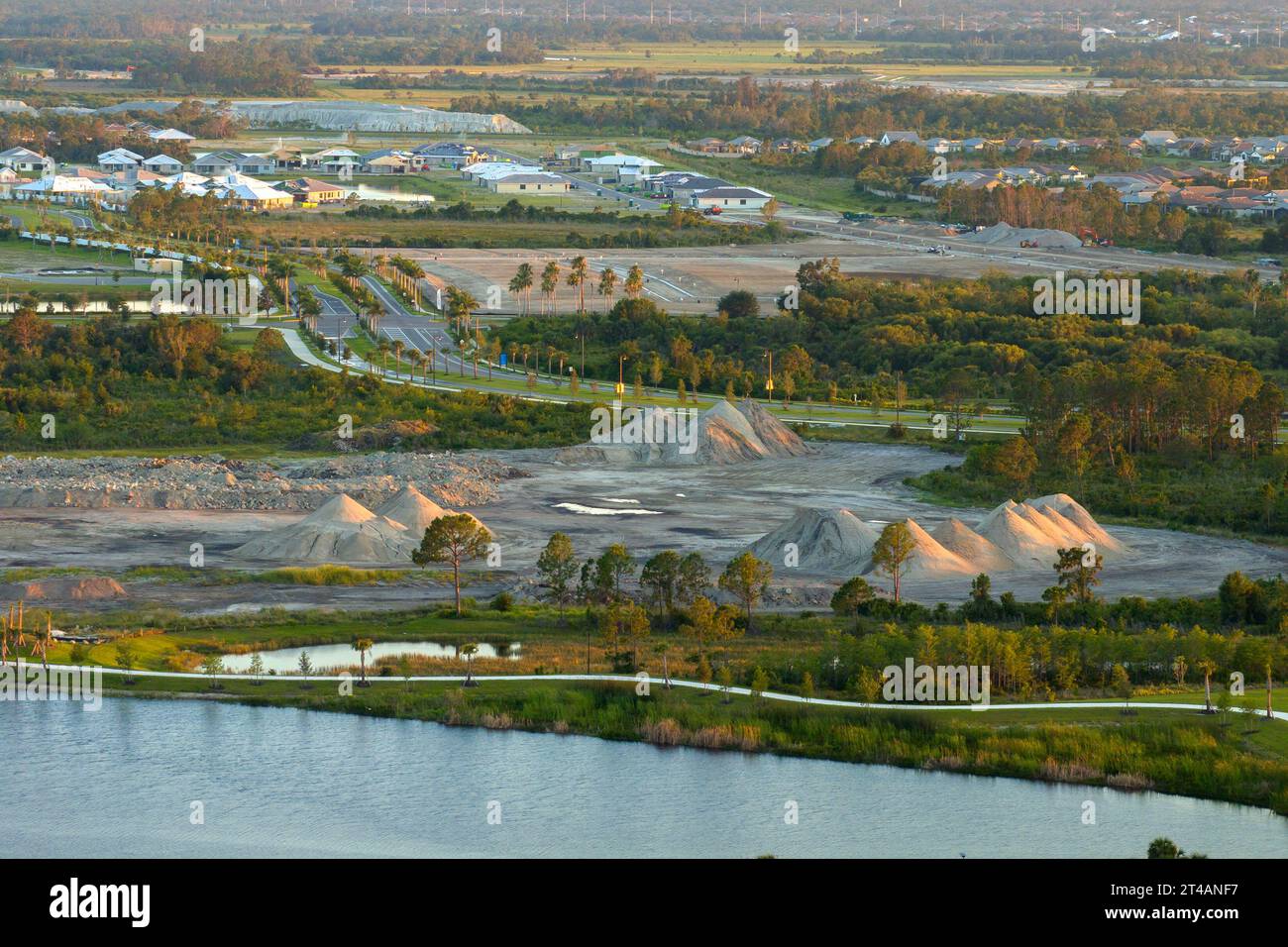 Construction site with building equipment on prepared ground in ...