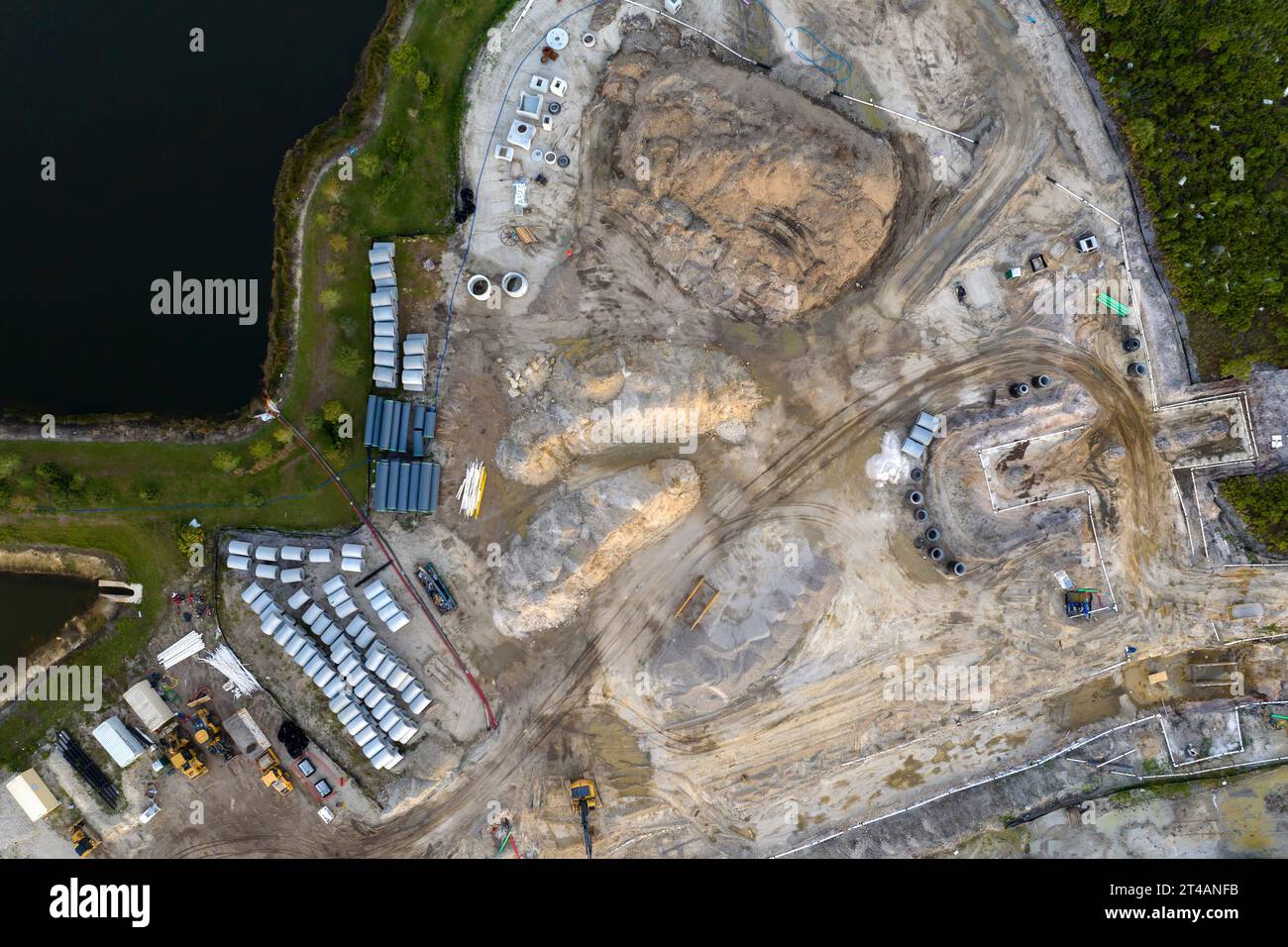 Construction site with building equipment on prepared ground in ...