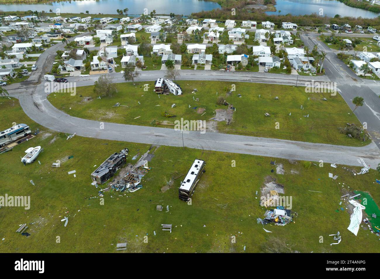 Hurricane damage to recreational vehicle camper vans and houses in ...