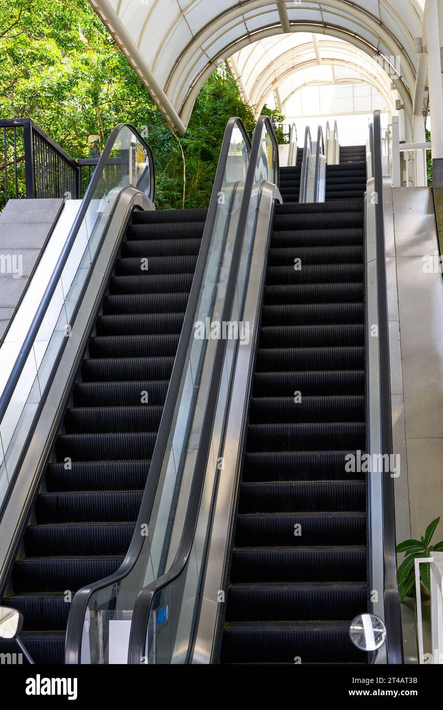Escalators installed outdoors in the city Stock Photo - Alamy