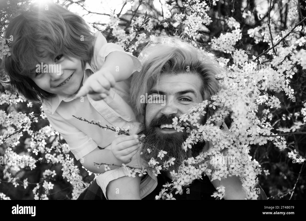 Family relationships and problems. Child with dad in summer park ...