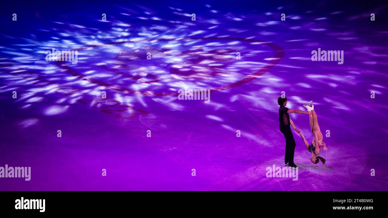 Kelly Ann Laurin and Loucas Ethier of Canada skate during the ...
