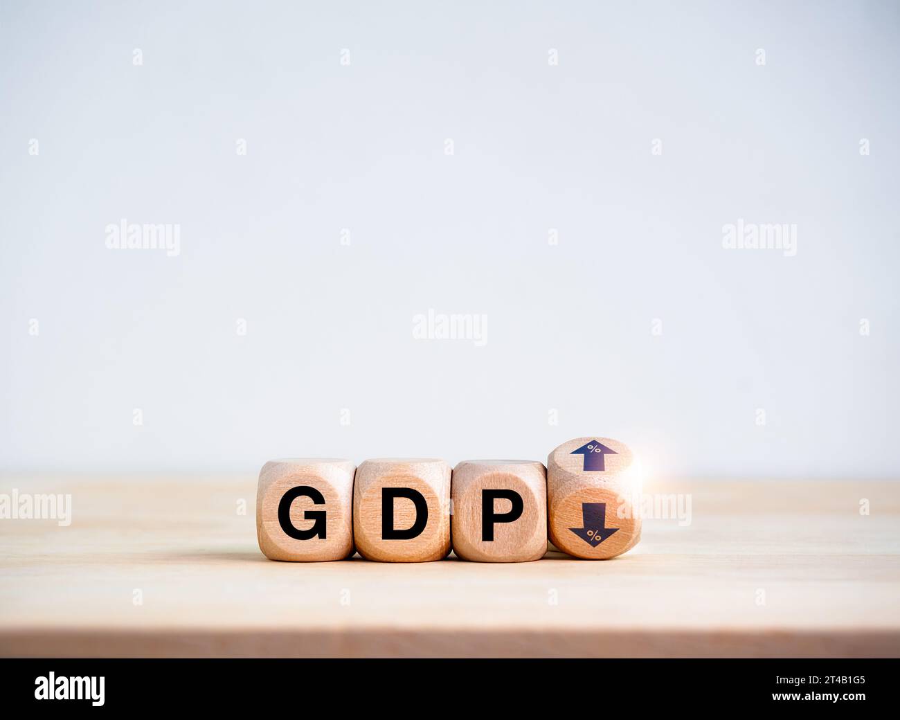 GDP business concept. Word "GDP" Gross domestic product on wooden cube ...