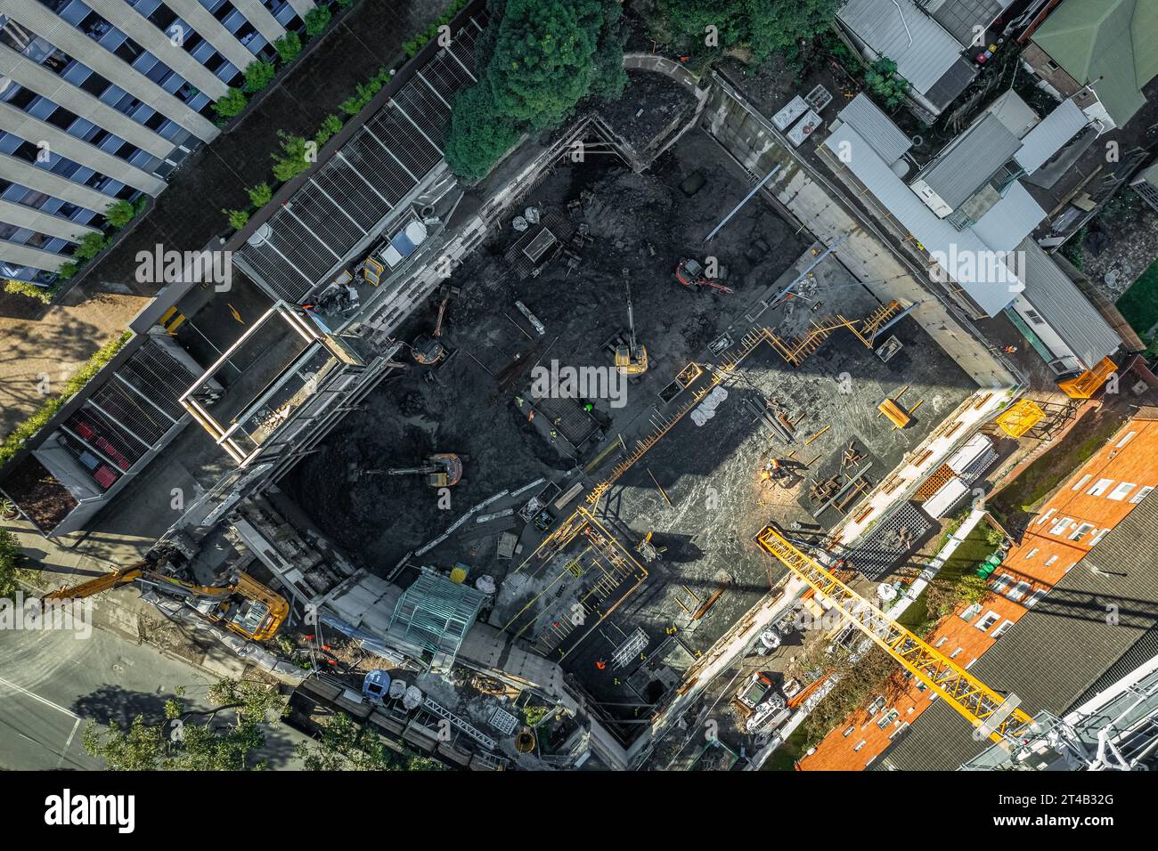 Aerial drone photo of demolition site and construction workers using ...