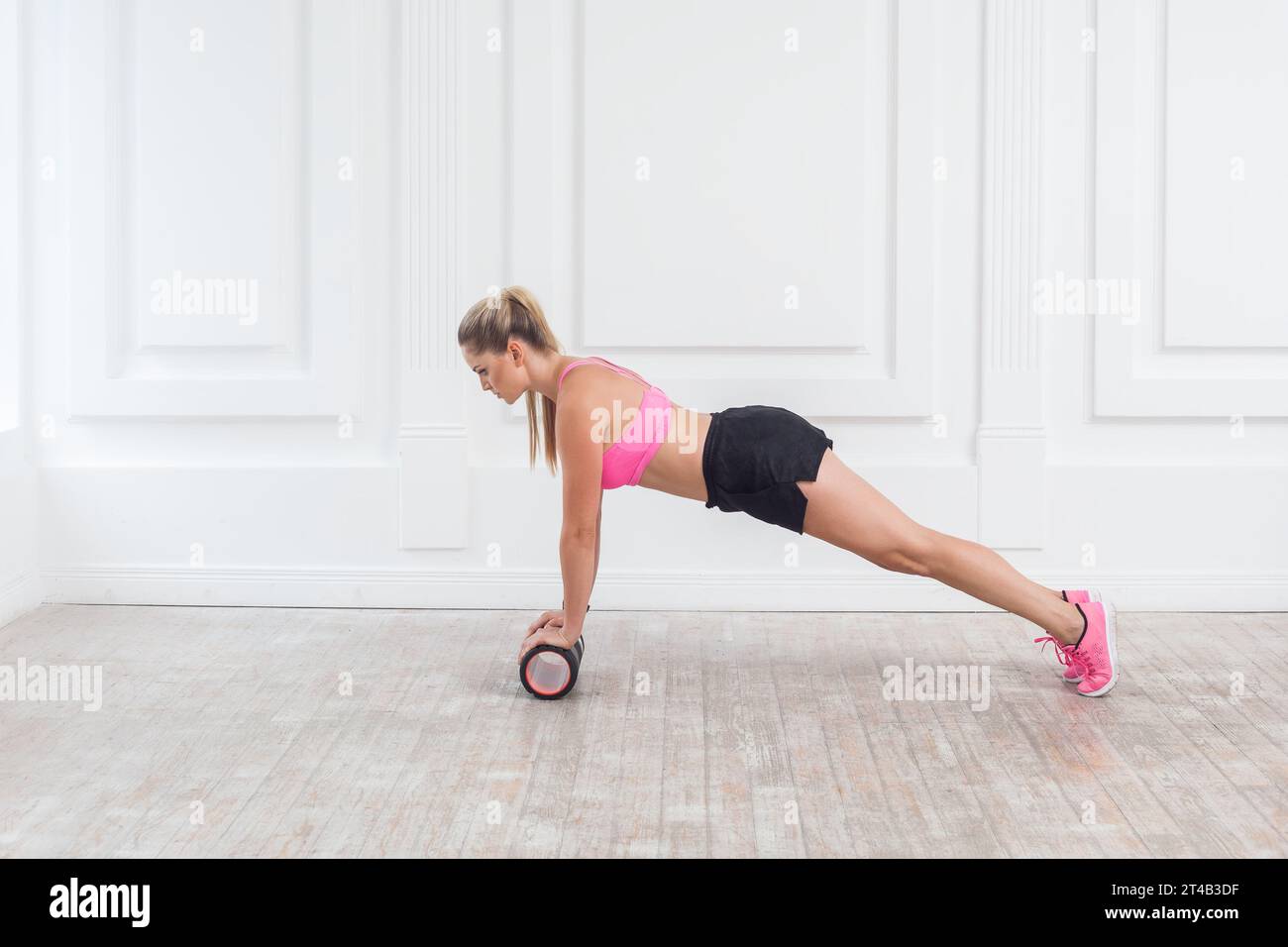 Girl using foam roller hi-res stock photography and images - Alamy