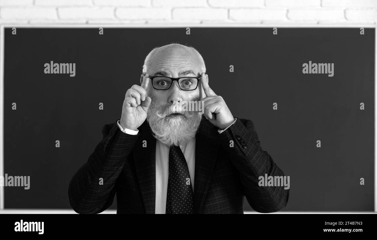 Funny senior professor in glasses. Surprised grey hair professor near ...