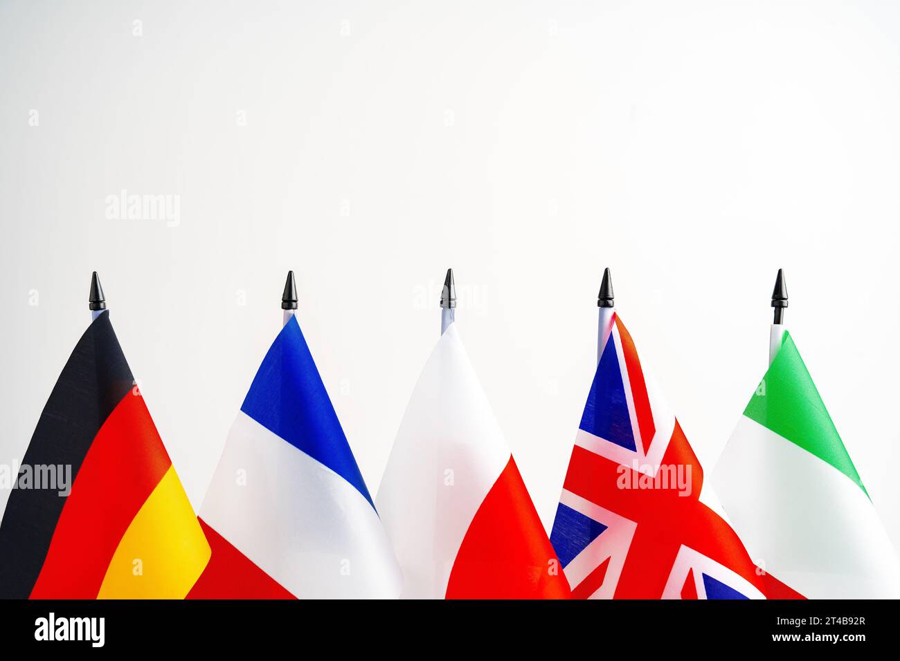 Lots of small national flags on table Stock Photo - Alamy
