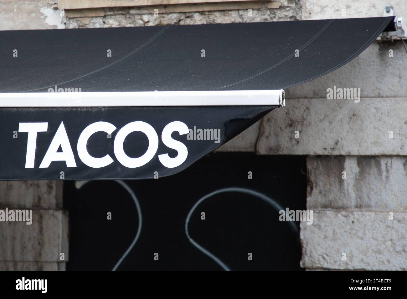 tacos text fastfood restaurant signboard on facade entrance sign Stock ...