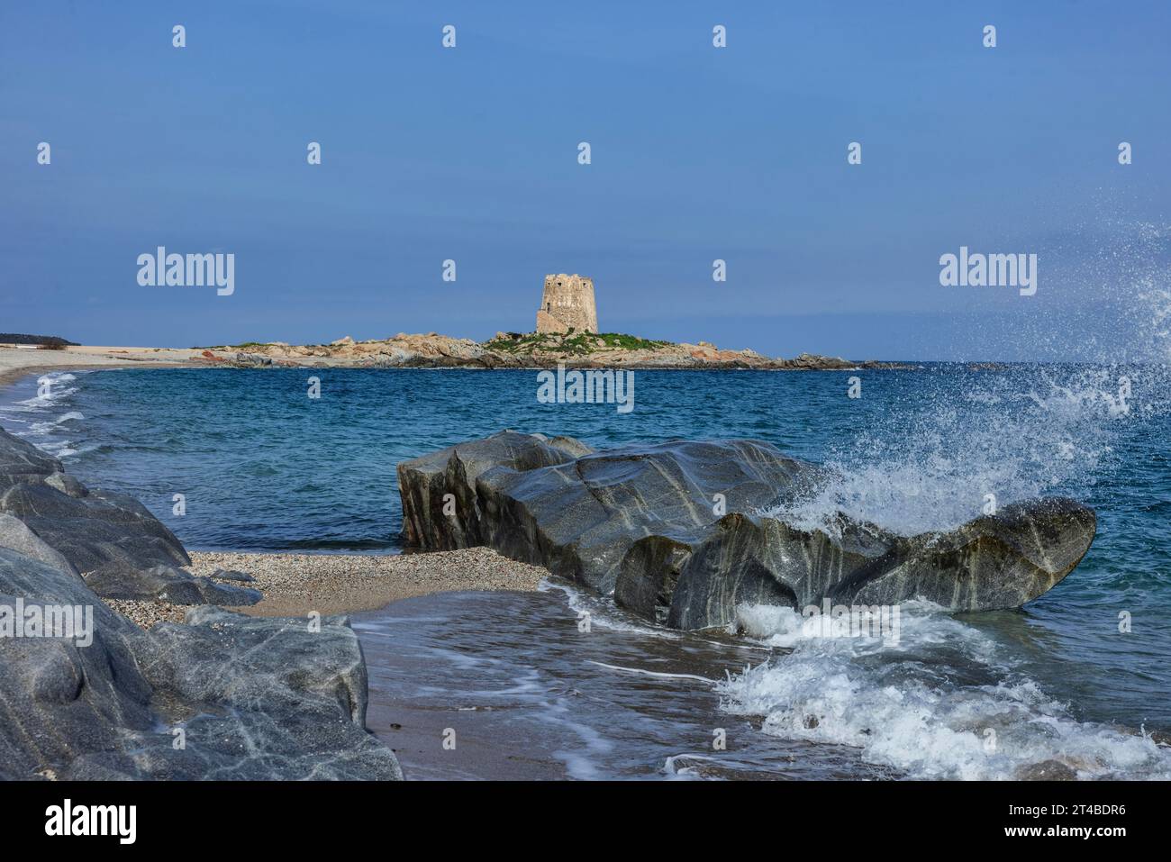 Pedal boats on the beach in front of the Torre di Bari Sardo, historic ...