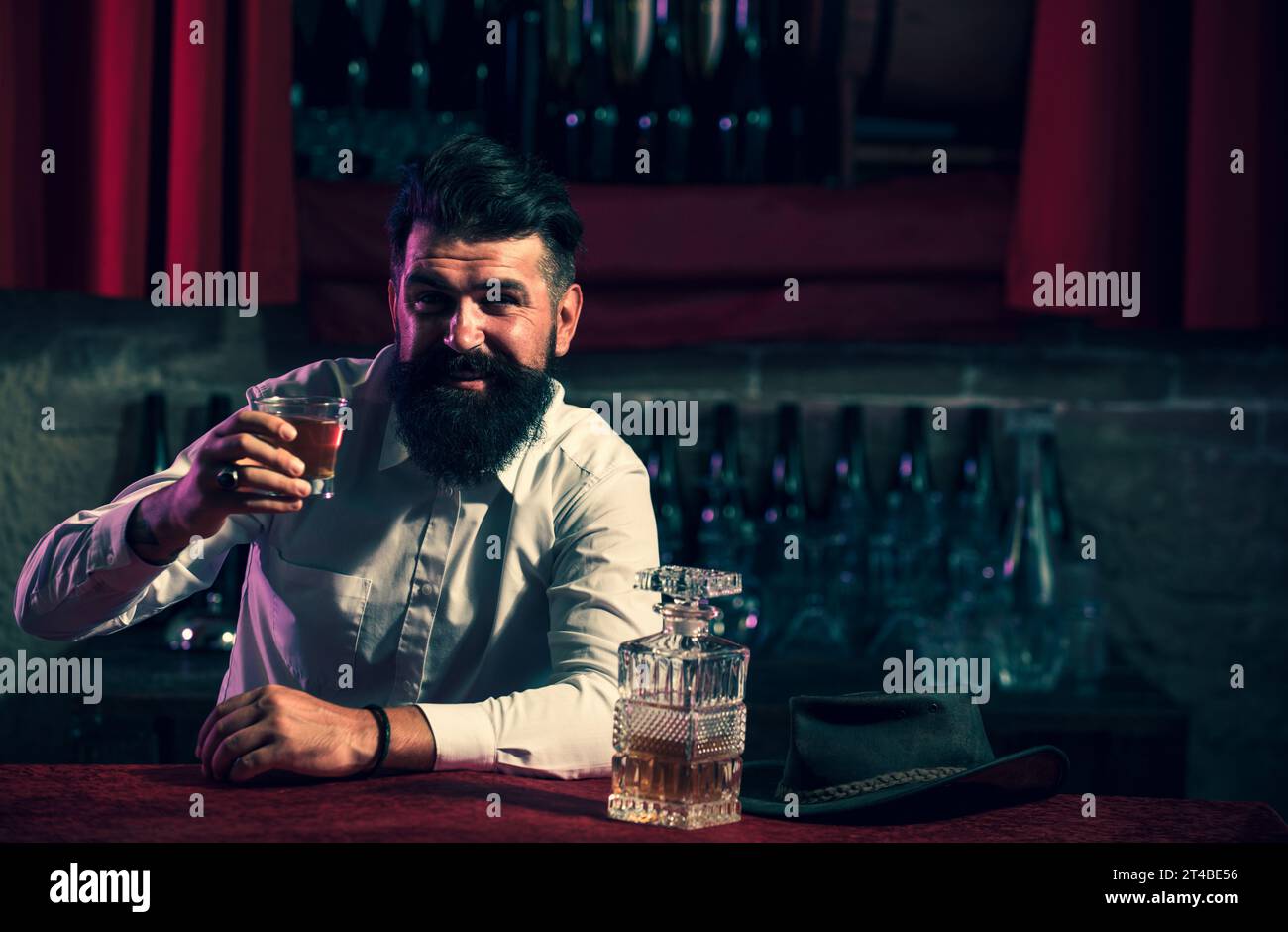 Luxury nightlife, rich man drink expensive beverage. Brandy scotch or ...