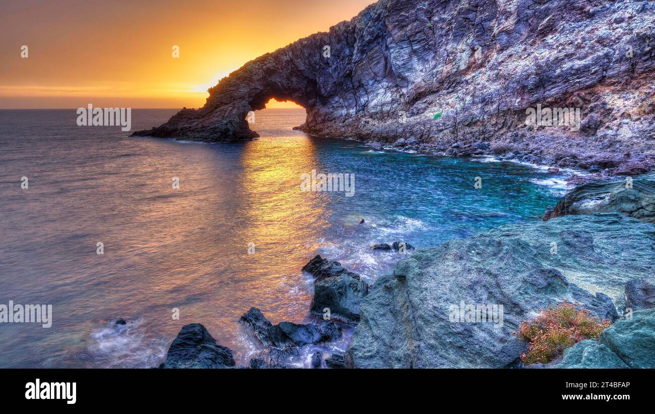 Dawn, Arco dell'Elefante, sunrise, rock gate, surf, rocks in water ...