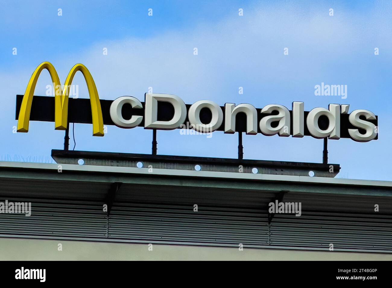 Logo yellow M in with lettering McDonald's above fast food restaurant ...