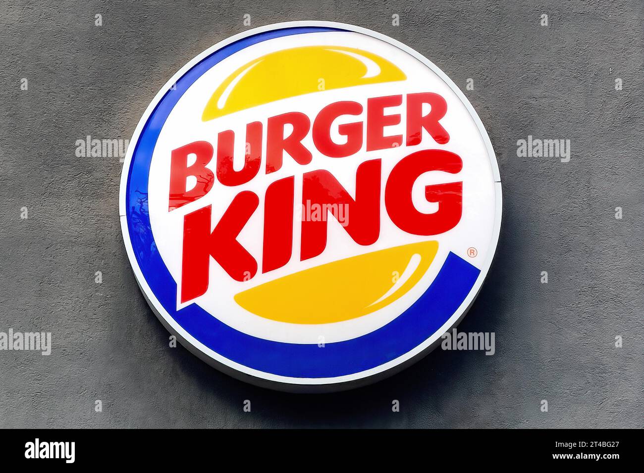Logo and advertising on wall of building for fast food chain Burger ...