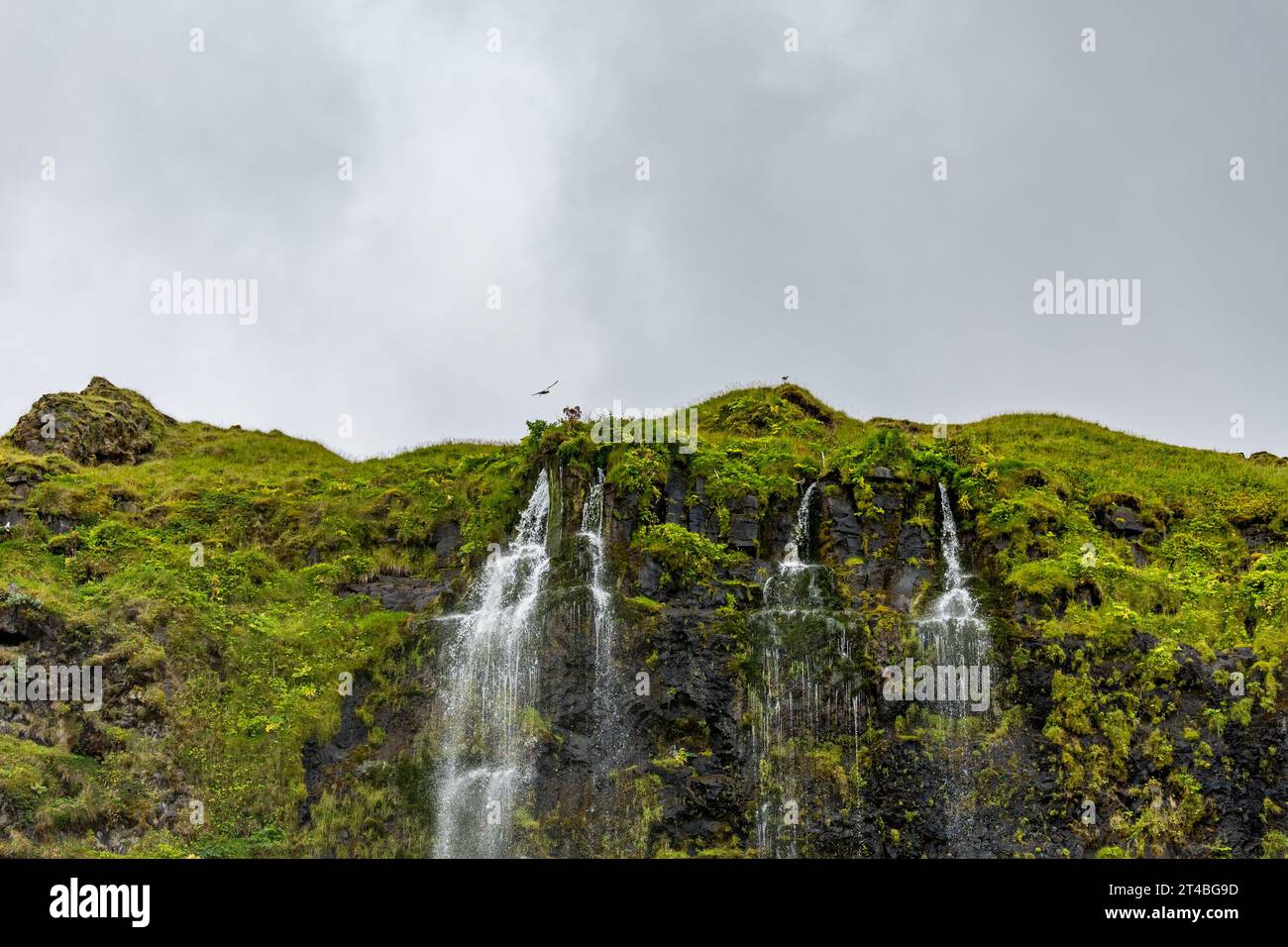 Flying over waterfall in mountains hi-res stock photography and images ...
