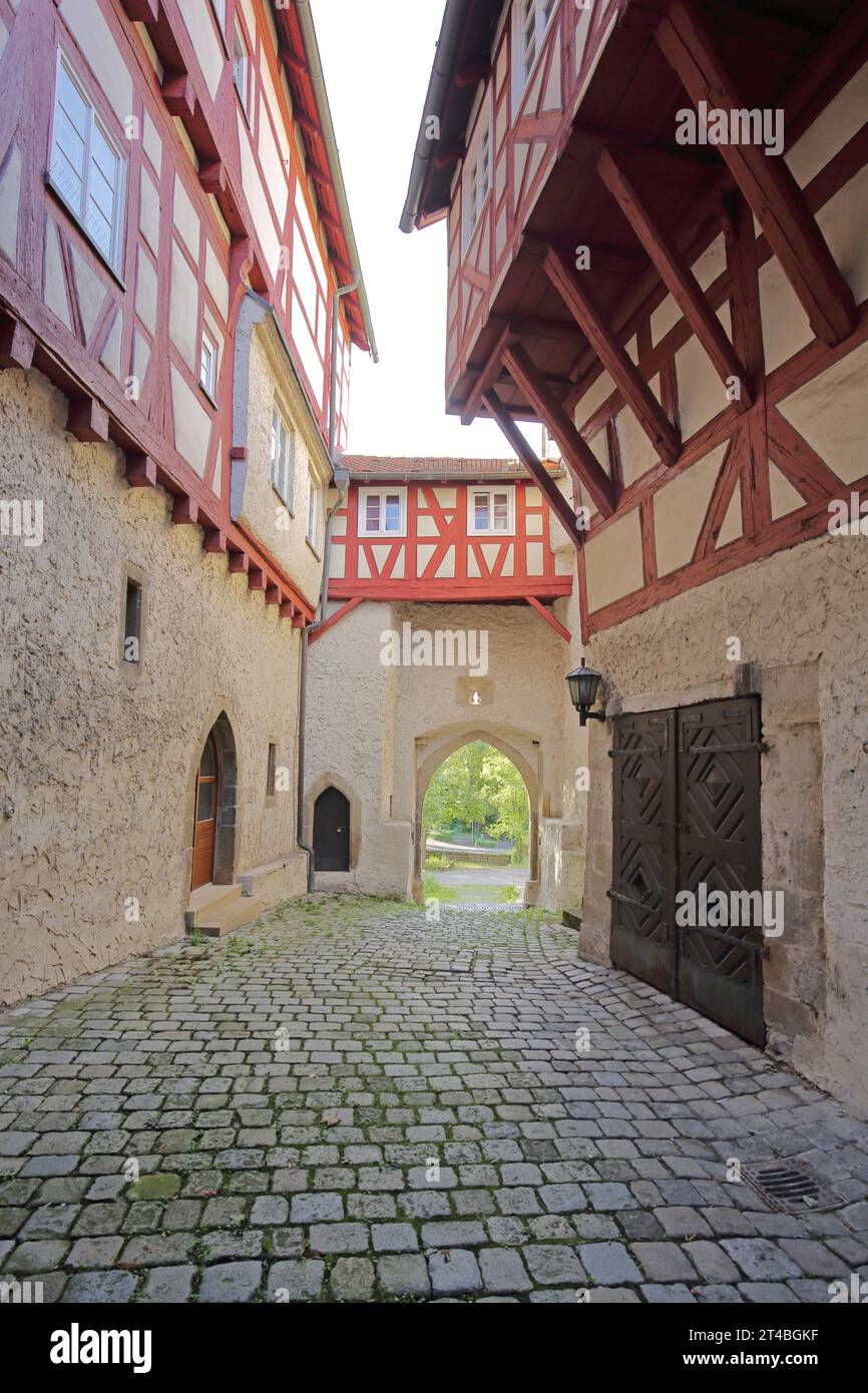 Inner courtyard with archway of the old castle built in the 13th ...