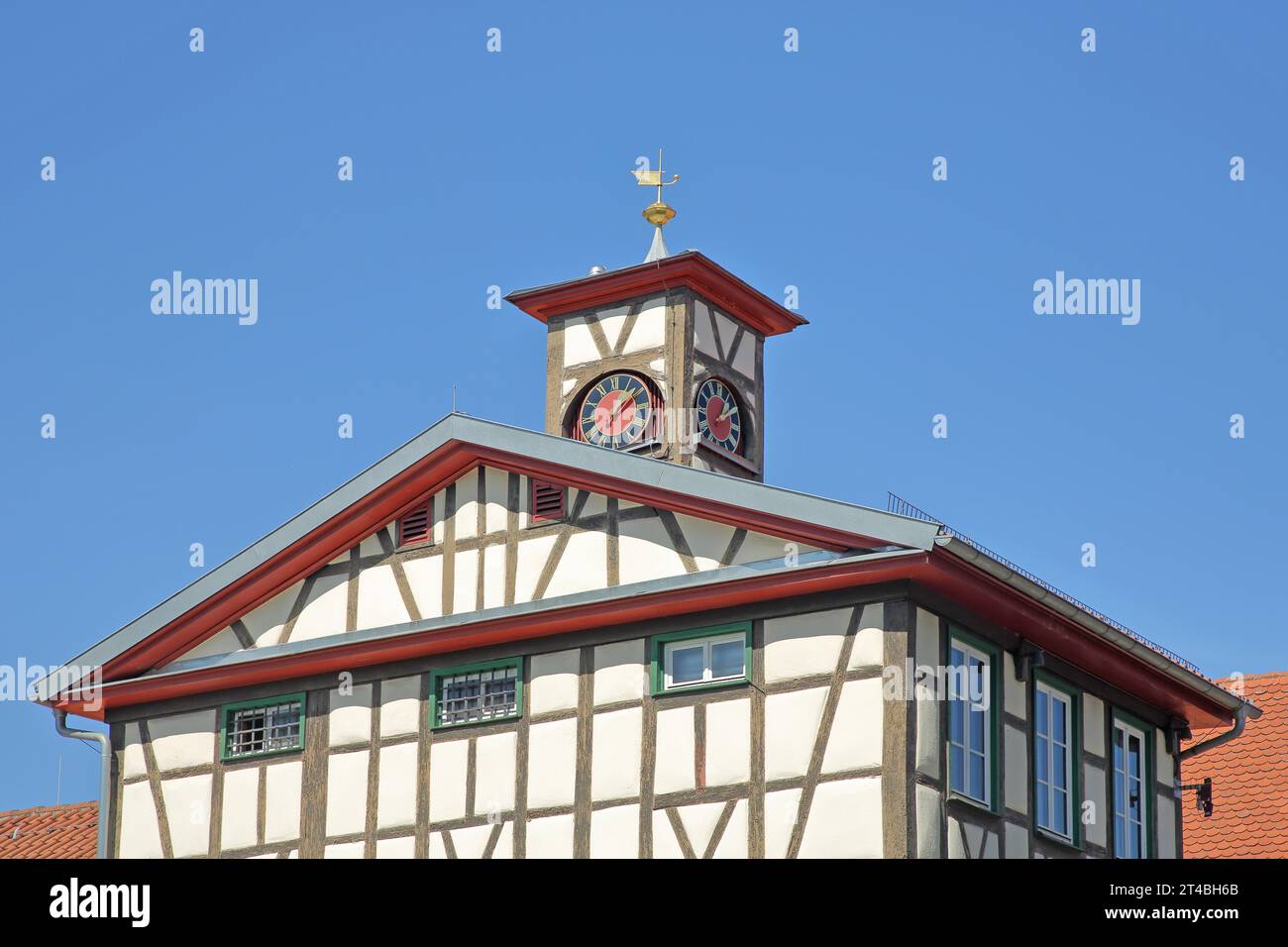 Historic guard house with spire and clock, ridge turret, half-timbered ...