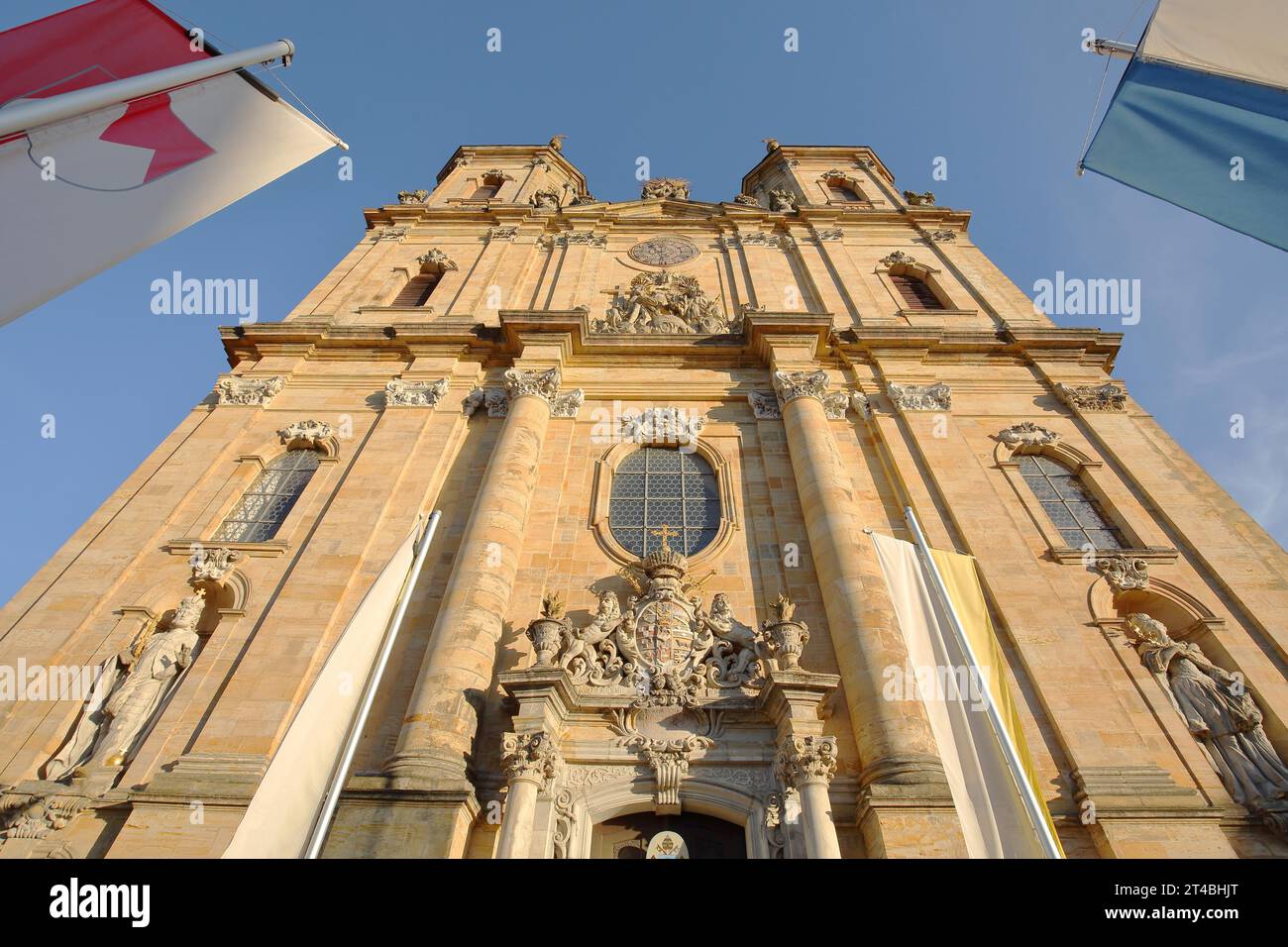 Baroque basilica with Bavarian national flag and Franconian flag, blue ...