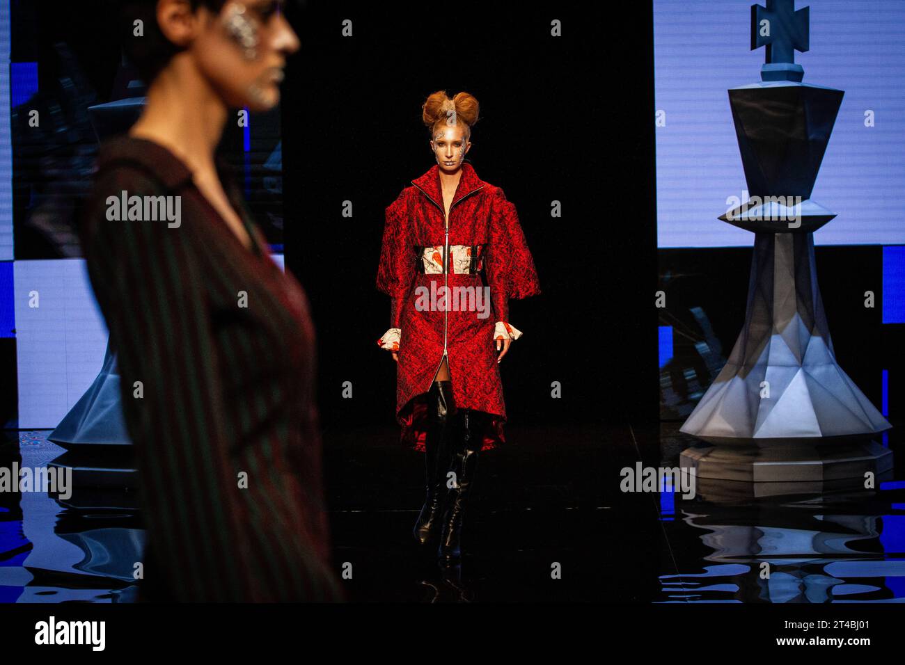 A model walks the runway during the Fabric Fancy by Sergey Khromchenkov ...