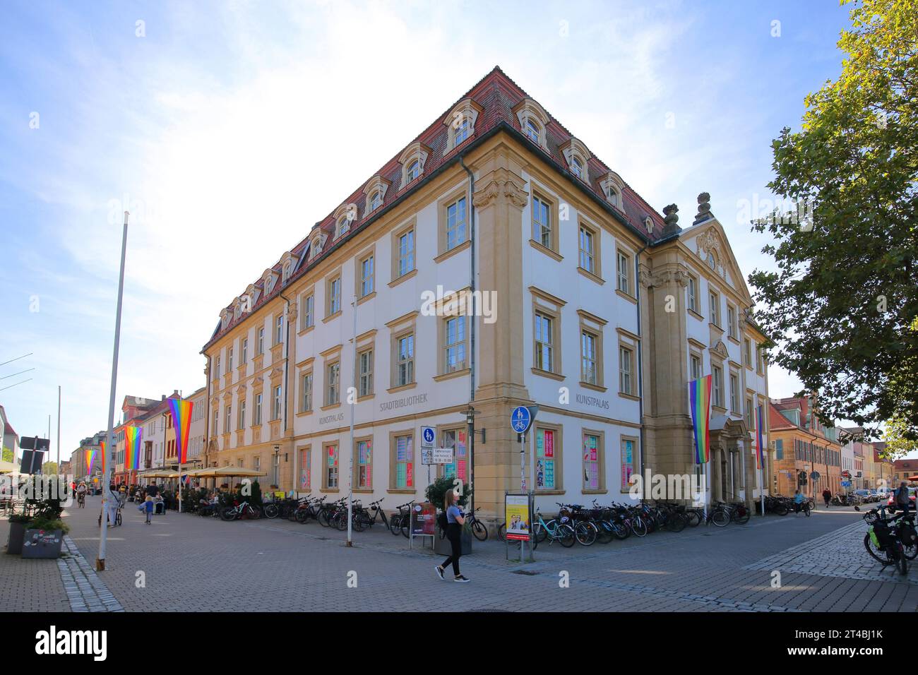 Palais Stutterheim, city library, art palace in backlight with flags ...