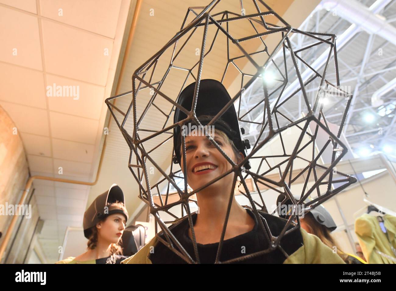 Moscow. Models before the start of the welding fashion show by artist ...