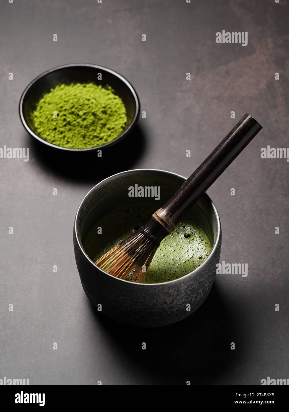 Matcha and matcha powder on dark background. Chasen, matcha Stock Photo ...