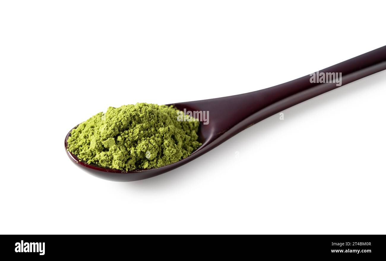 Matcha and wooden spoon on white background. Matcha powder Stock Photo ...