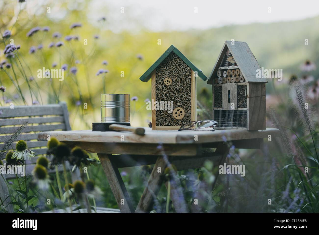 Wooden insect house outdoors in the garden. Bug hotel as home for ...
